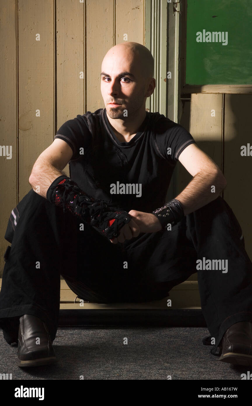 Sinister character illuminated by harsh lighting Stock Photo - Alamy