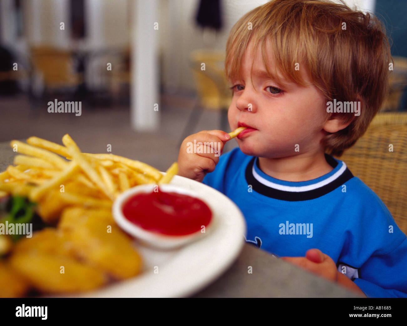 Boy chips ketchup hi-res stock photography and images - Alamy