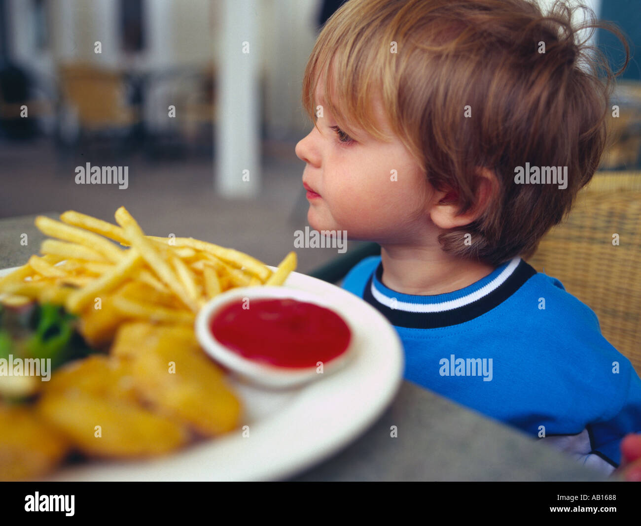 Boy chips ketchup hi-res stock photography and images - Alamy
