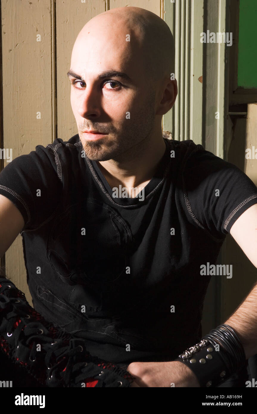 Sinister character illuminated by harsh lighting Stock Photo - Alamy