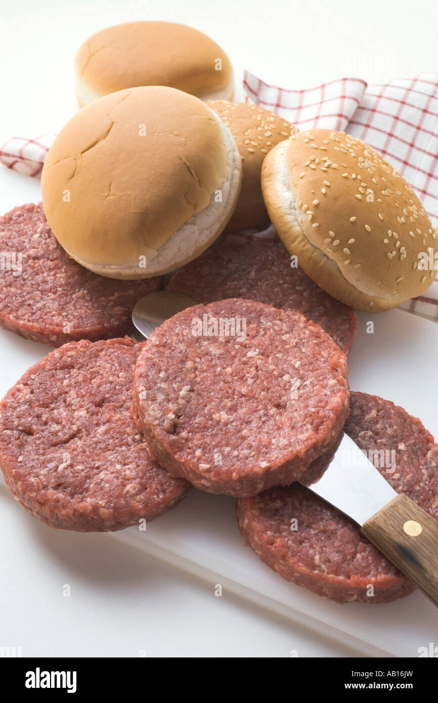 Raw beefburgers and hamburger rolls FoodCollection Stock Photo - Alamy