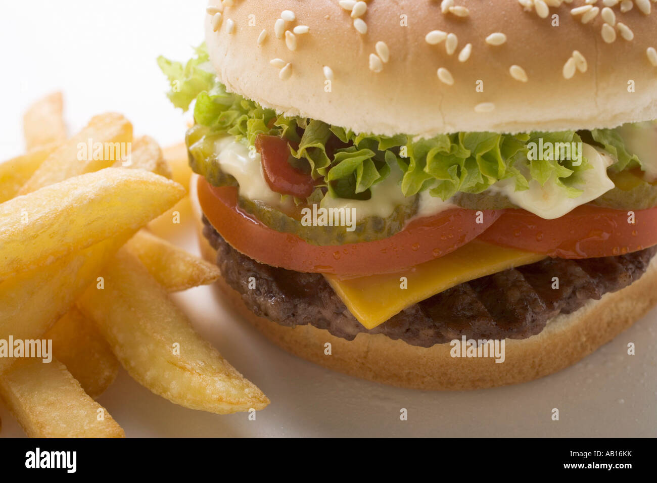 Cheeseburger with chips FoodCollection Stock Photo - Alamy