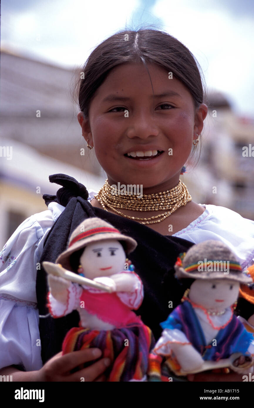 Ecuadorian girl selling dolls Stock Photo - Alamy