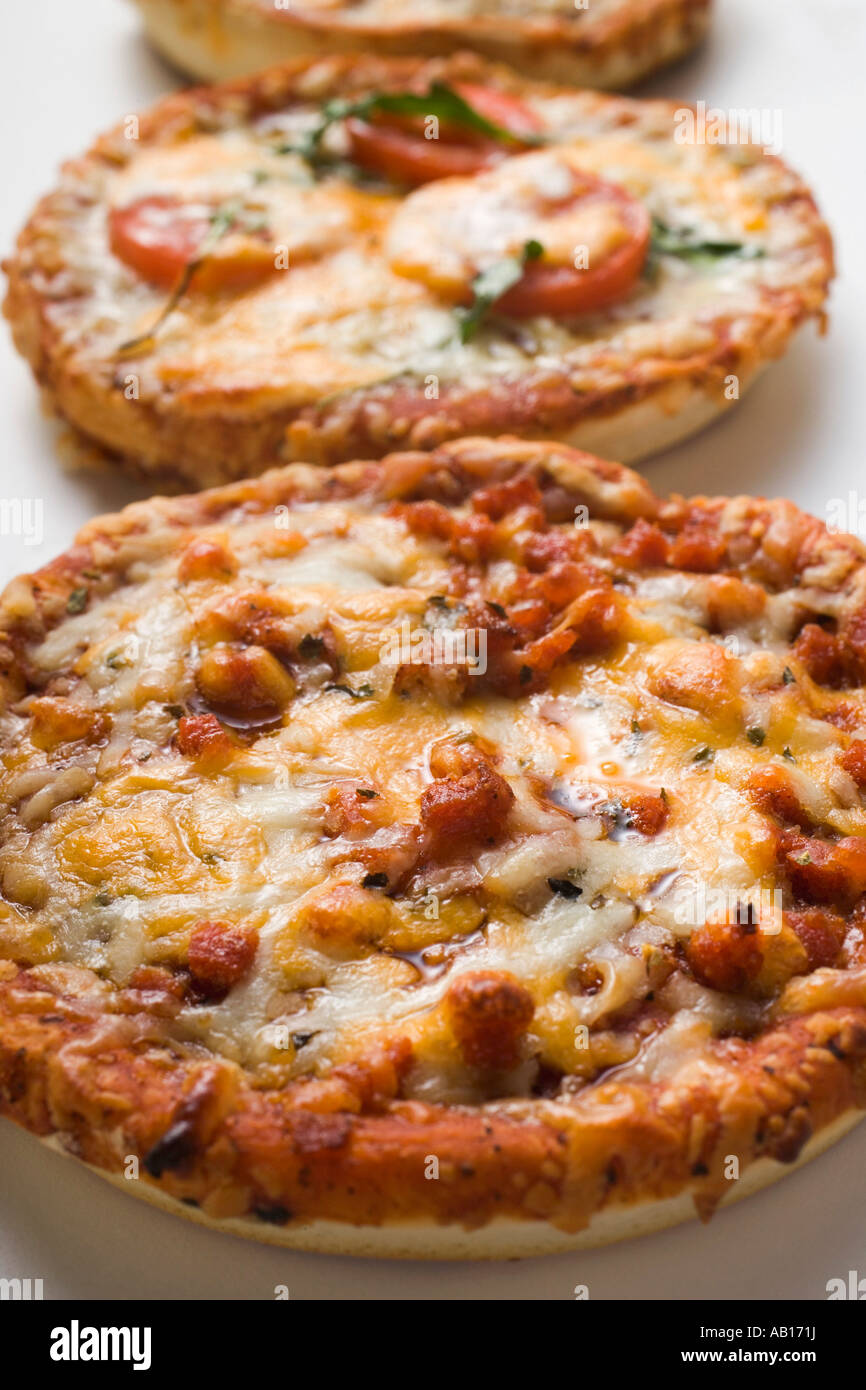 Three different mini pizzas mince tomato cheese FoodCollection Stock ...