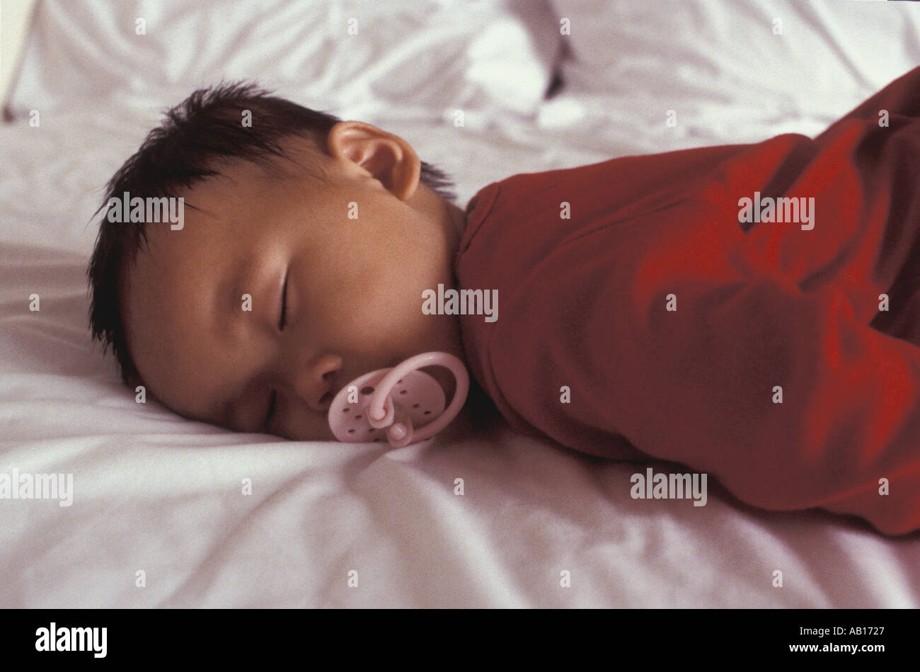 Asian baby sleeping Stock Photo - Alamy