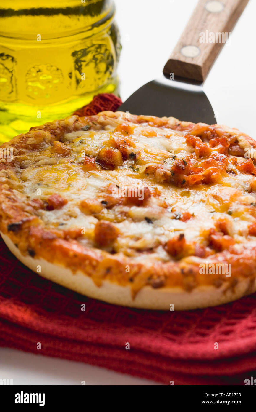 Mini pizza with mince and cheese on server FoodCollection Stock Photo ...