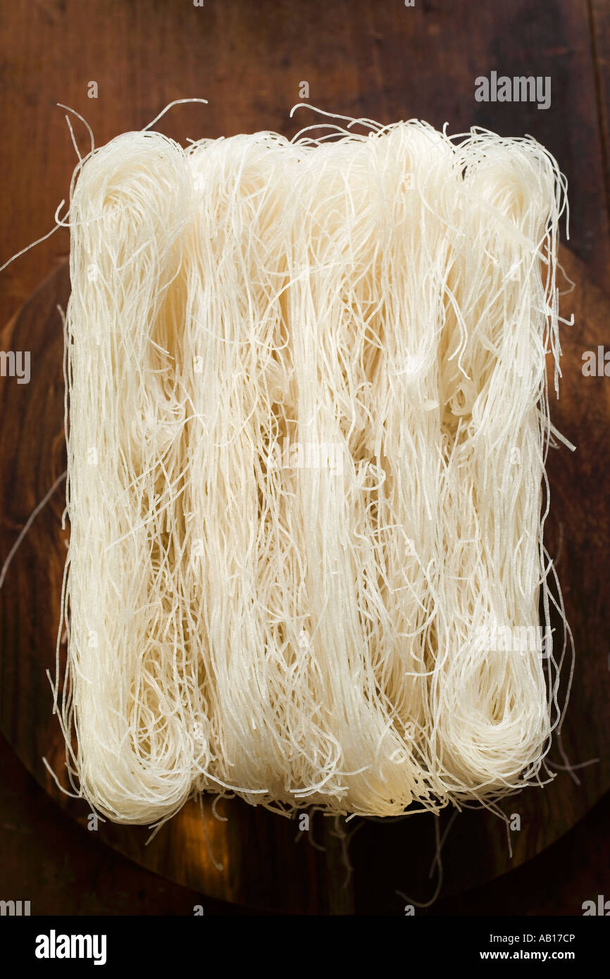 Thin rice noodles on wooden plate FoodCollection Stock Photo - Alamy