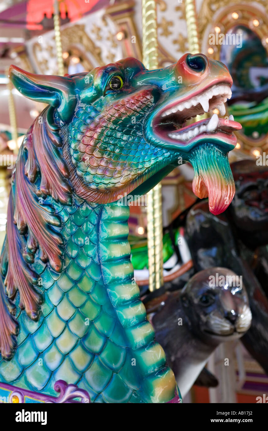 A dragon head on a merry go round Stock Photo - Alamy