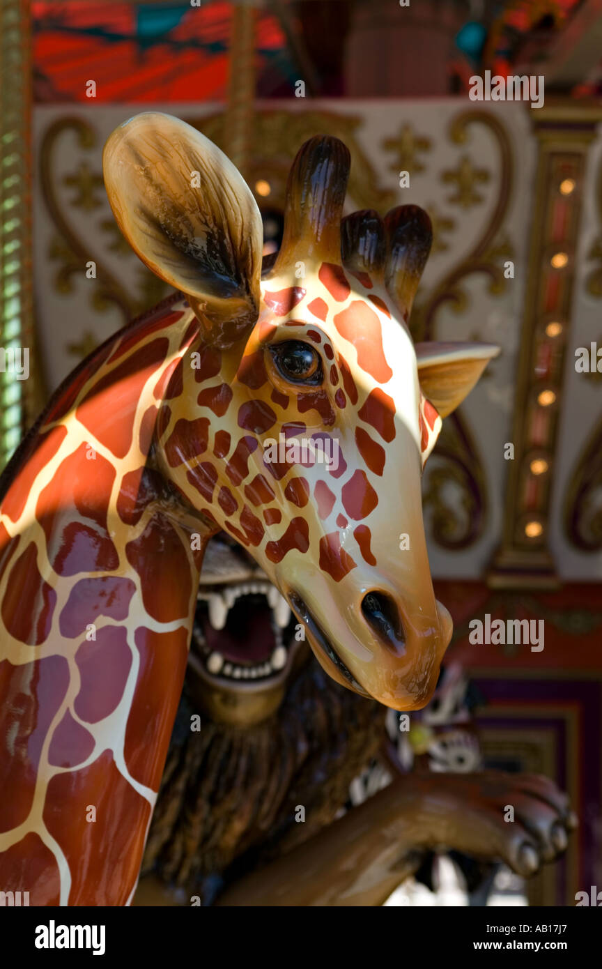 Head of a giraffe on a merry go round Stock Photo - Alamy