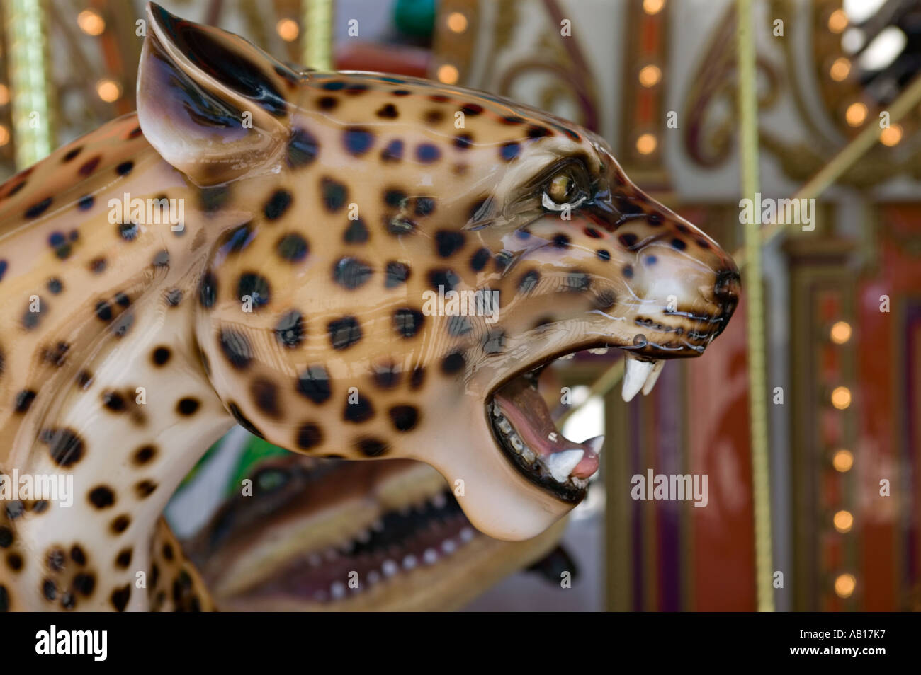 The head of a cheetah on a merry go round Stock Photo - Alamy