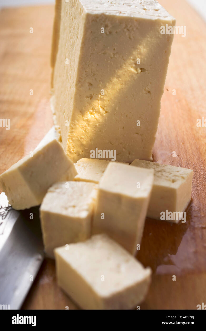 Block of tofu diced tofu and Asian knife FoodCollection Stock Photo - Alamy