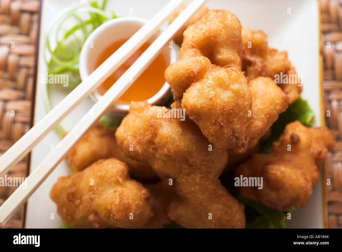 Asian chicken nuggets with apricot sauce FoodCollection Stock Photo - Alamy