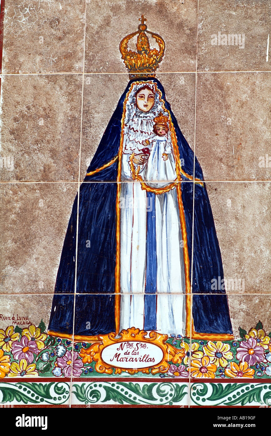 A Spanish religious wall tile. Virgin Mary wearing a crown. Madrid ...