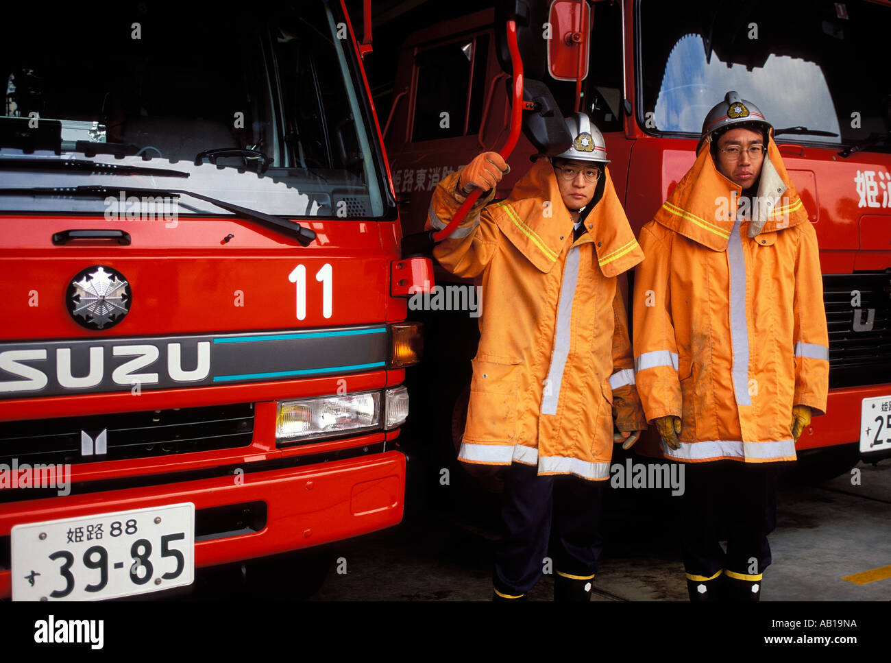 Firemen with their firetrucks in Himeji Japan Stock Photo - Alamy
