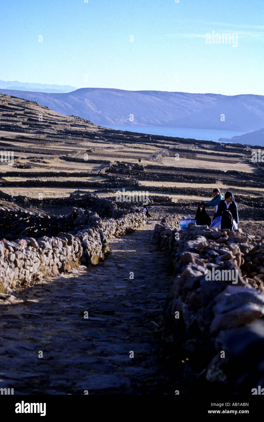 Trail on the rocky altiplano island of Isla Amantani Lake Titicaca Peru ...
