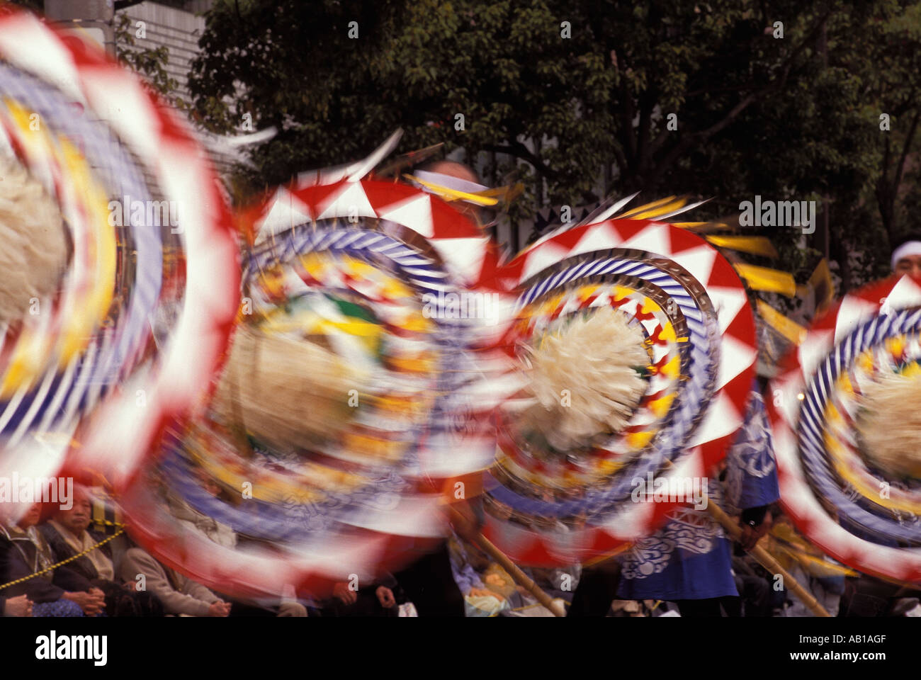 Men dance with umbrellas at the festival of the forty seven Samurai in ...