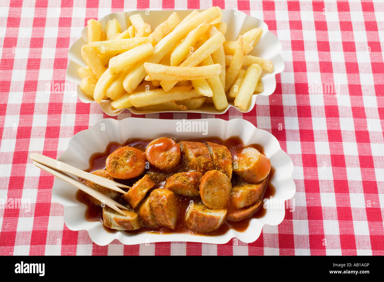 Currywurst sausage with ketchup curry powder with chips FoodCollection ...