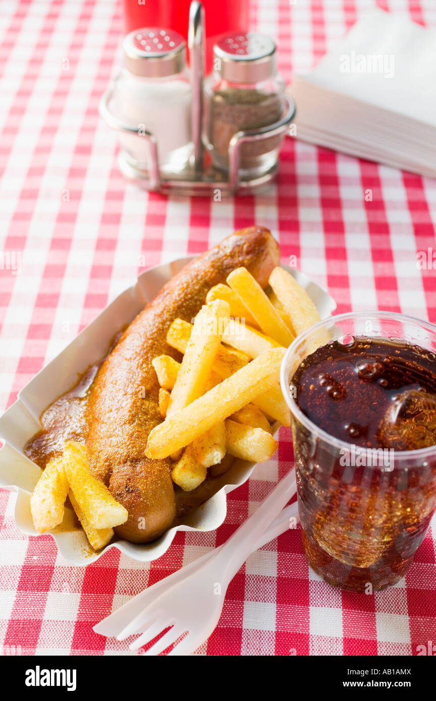 Currywurst sausage with ketchup curry powder chips cola FoodCollection ...