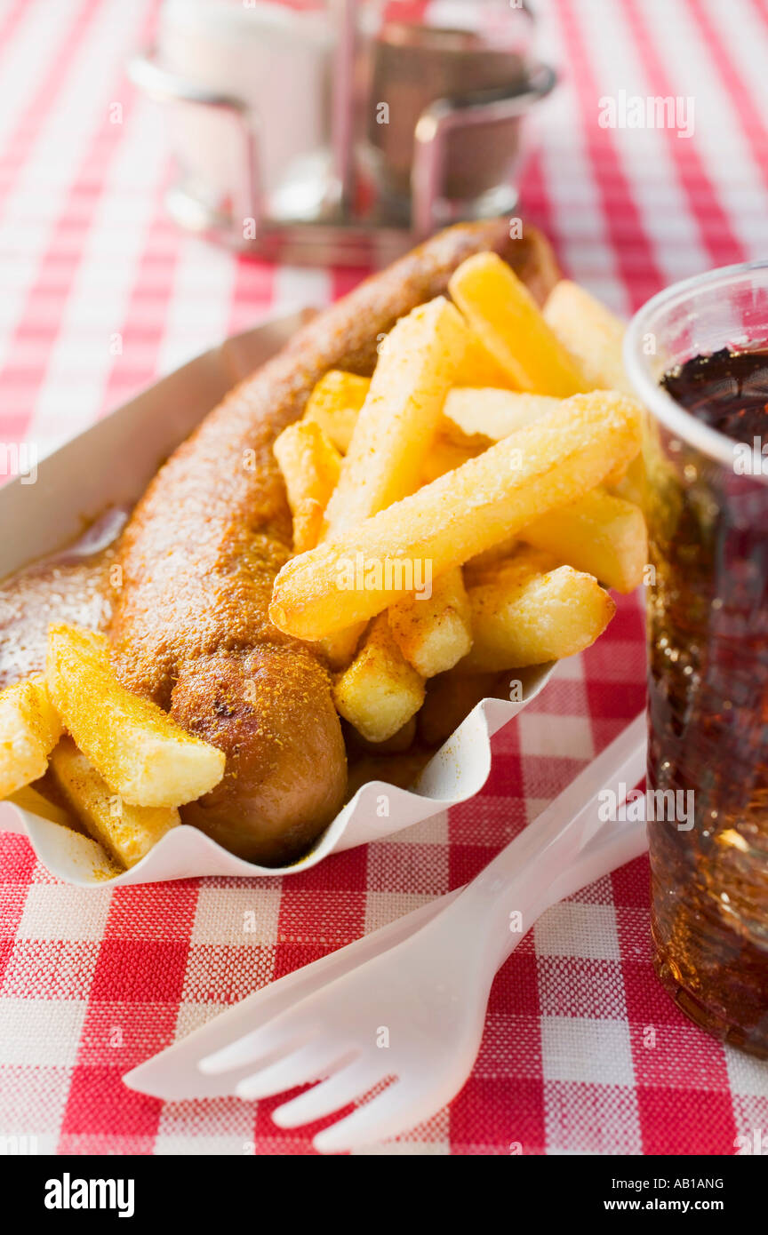 Currywurst sausage with ketchup curry powder chips cola FoodCollection ...