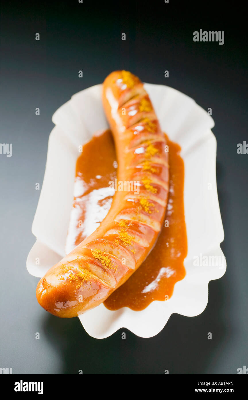 Currywurst sausage with ketchup curry powder in paper dish ...