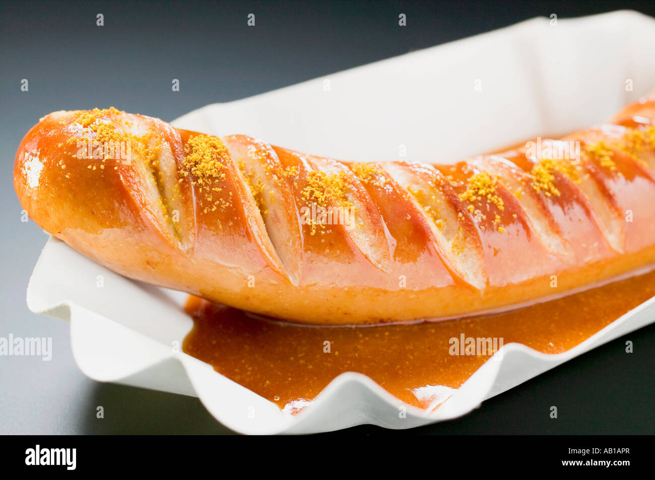 Currywurst sausage with ketchup curry powder in paper dish ...