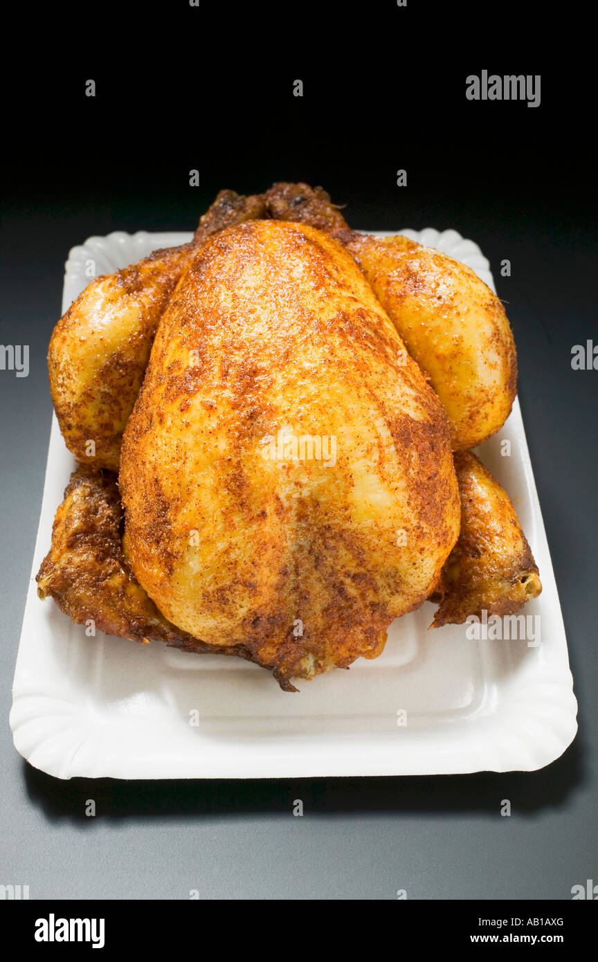 Whole roast chicken on paper plate FoodCollection Stock Photo - Alamy