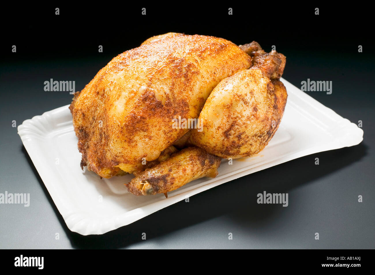Whole roast chicken on paper plate FoodCollection Stock Photo - Alamy