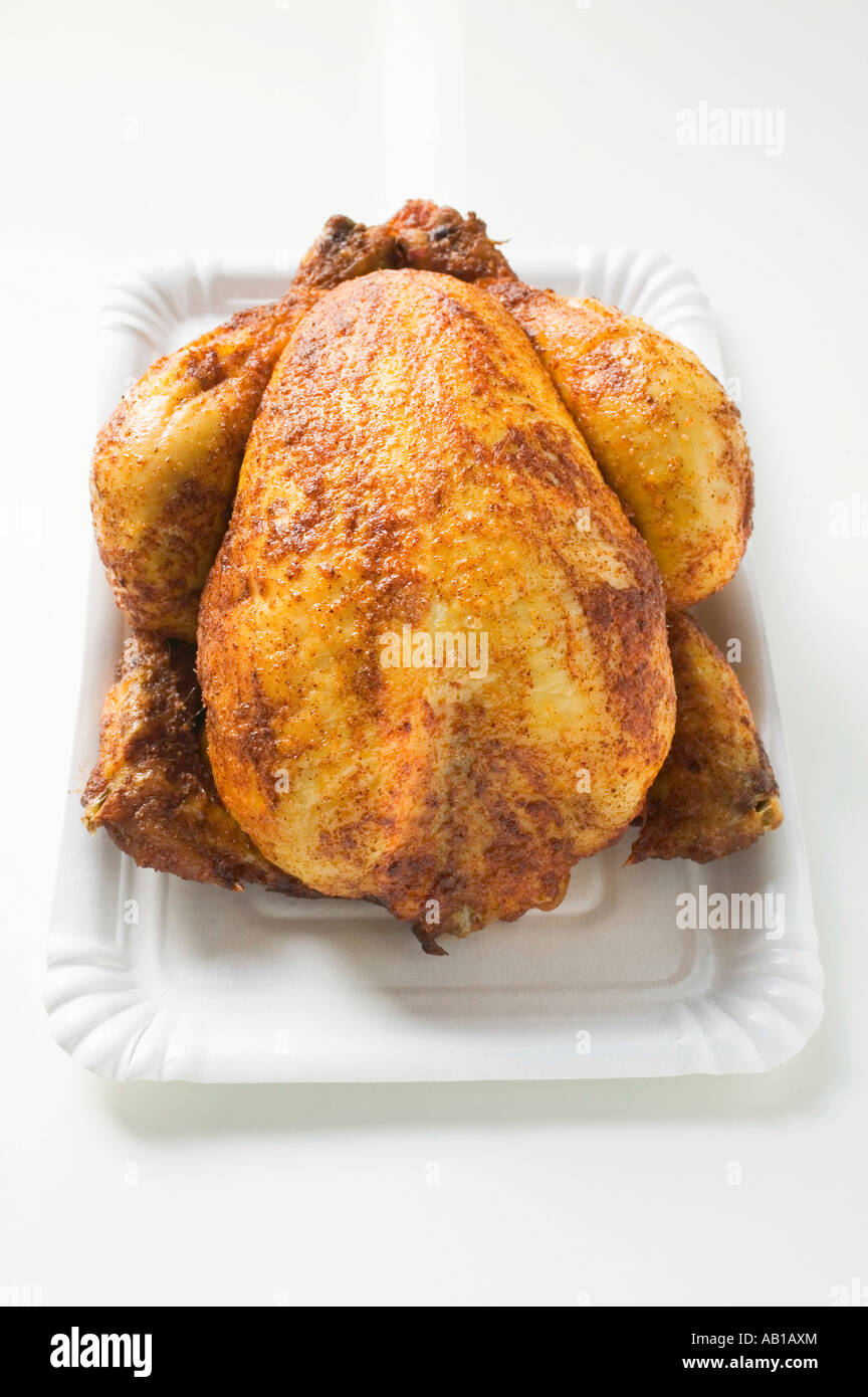 Whole roast chicken on paper plate FoodCollection Stock Photo - Alamy