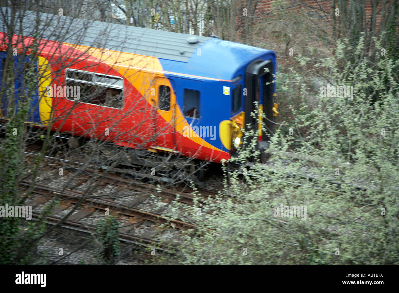 London Commuter Train at Speed Stock Photo - Alamy