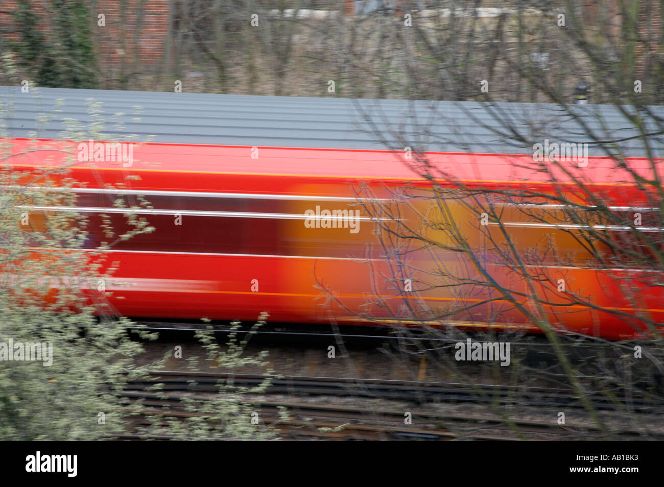 London Commuter Train at Speed Stock Photo - Alamy