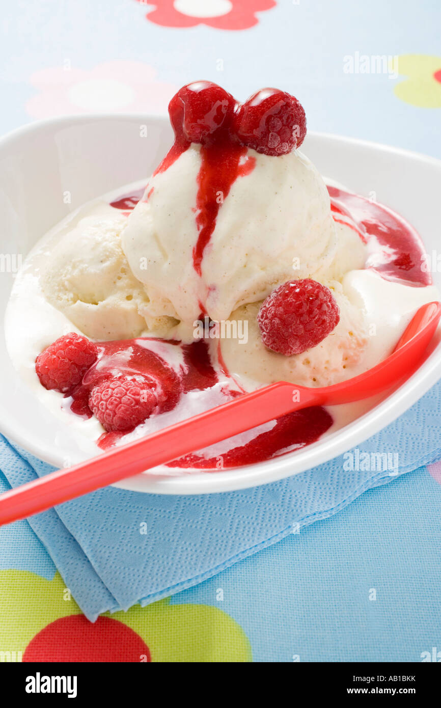 Vanilla ice cream with raspberry sauce FoodCollection Stock Photo - Alamy