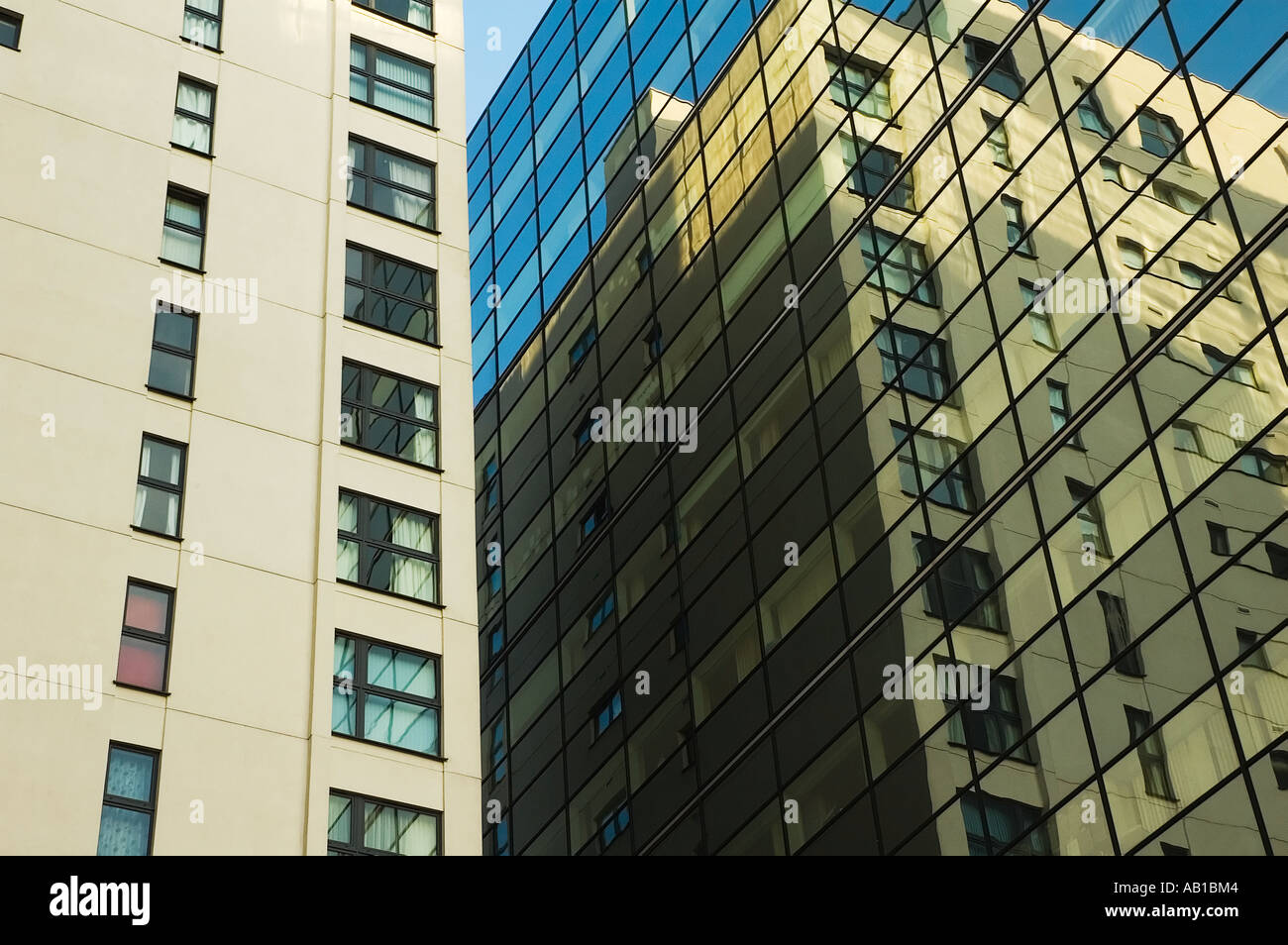 Modern building reflected with reflection in a glass office block Stock ...