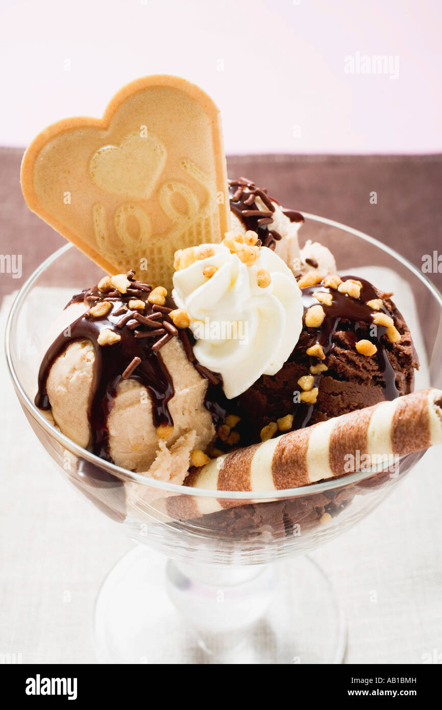 Chocolate nut sundae with cream and wafers FoodCollection Stock Photo ...