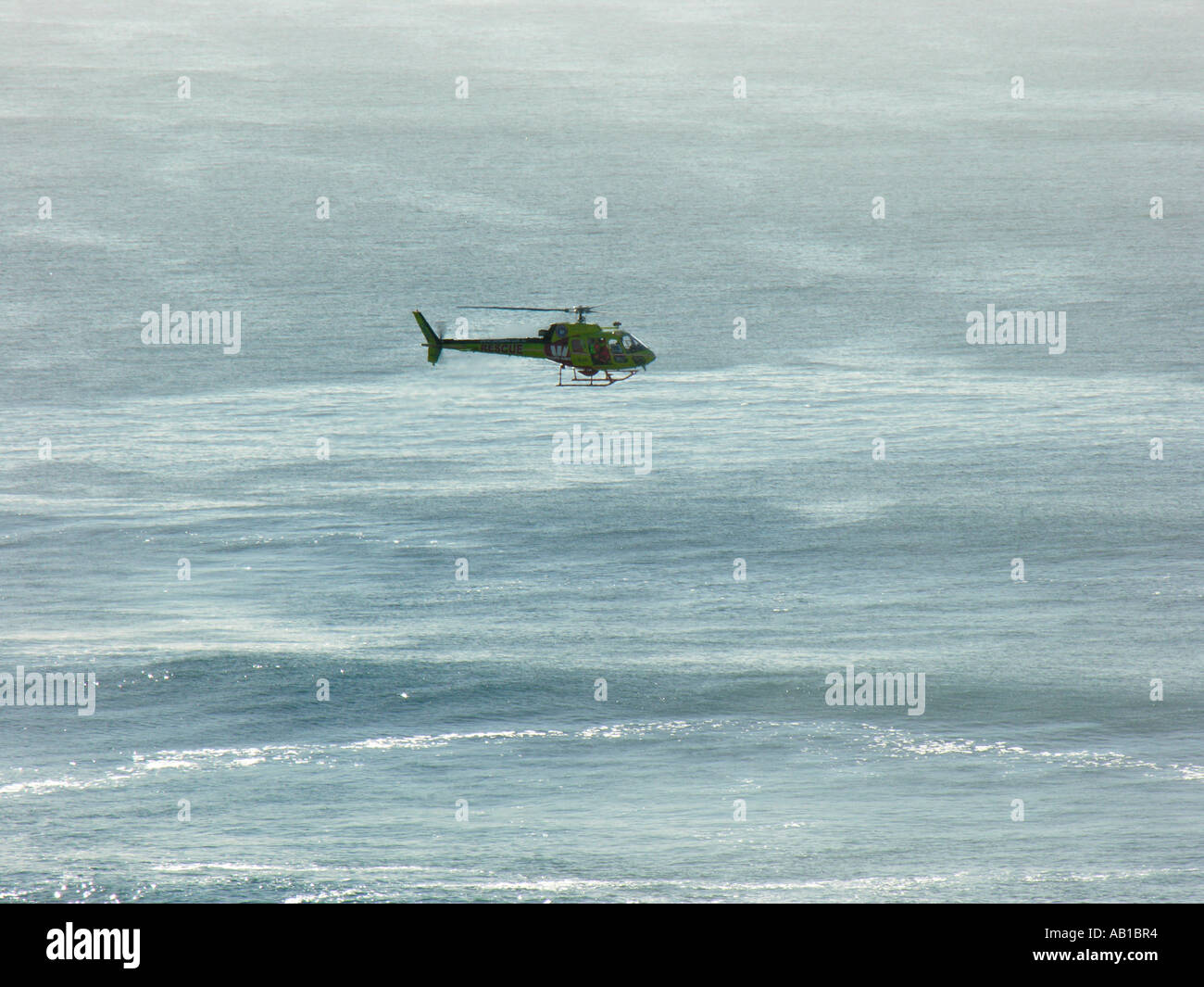 Sea rescue helicopter flying across water Goldcoast Queensland ...