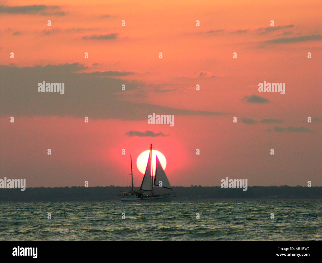Sailboat at sunset cruise Darwin Harbour Northern Territory Australia ...