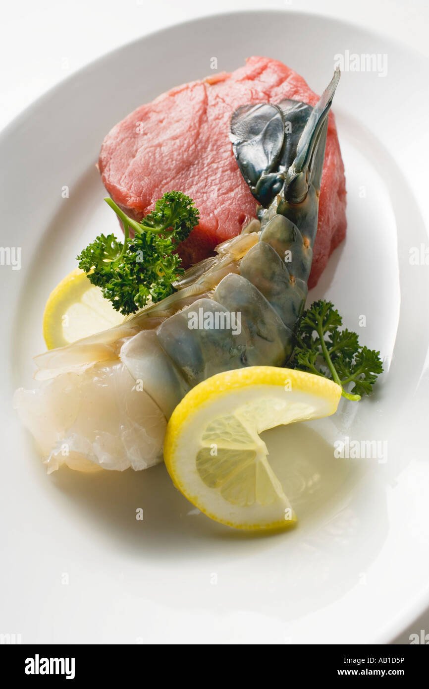 Beef fillet and king prawn with parsley and lemon FoodCollection Stock ...