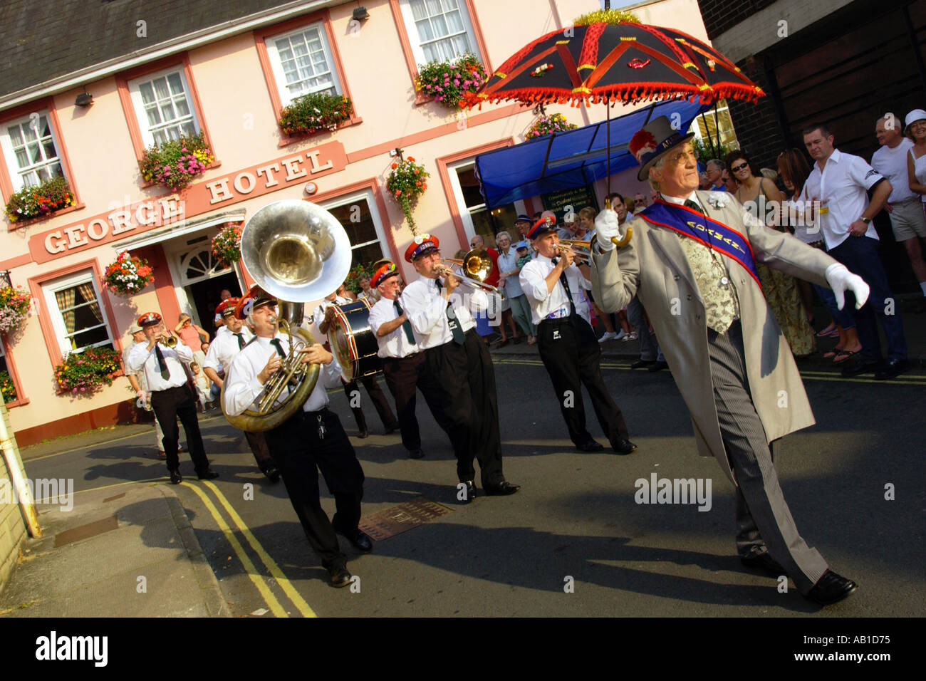 Adamant New Orleans Parade Band march thru the streets of Brecon during ...