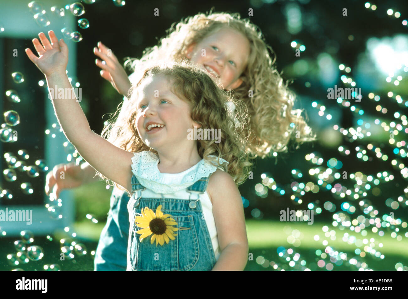 Children Reach For Bubbles High Resolution Stock Photography and Images ...