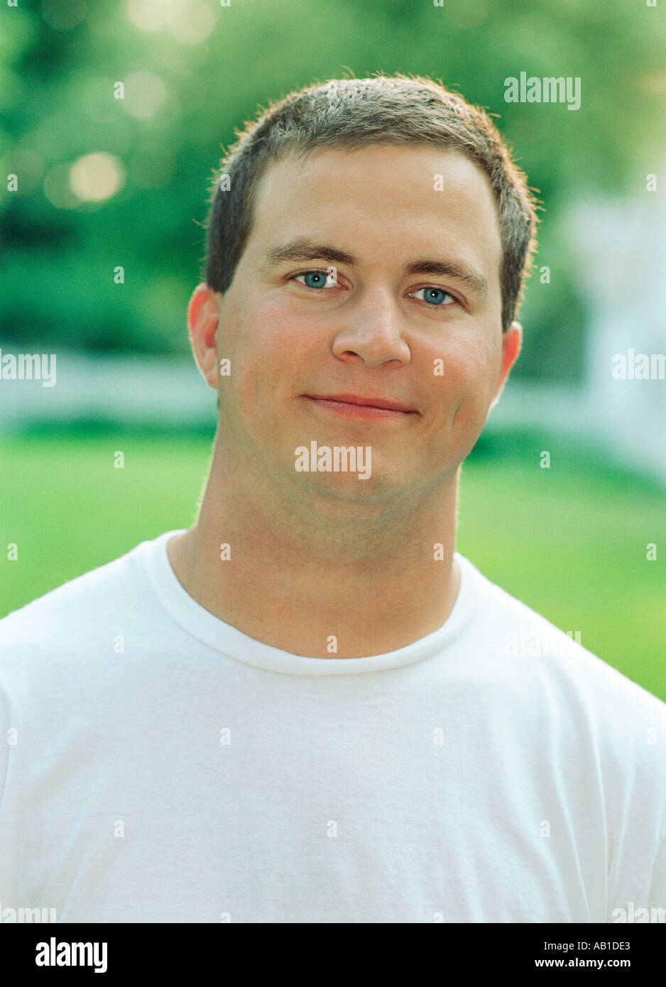Male tshirt looking at camera hi-res stock photography and images - Alamy