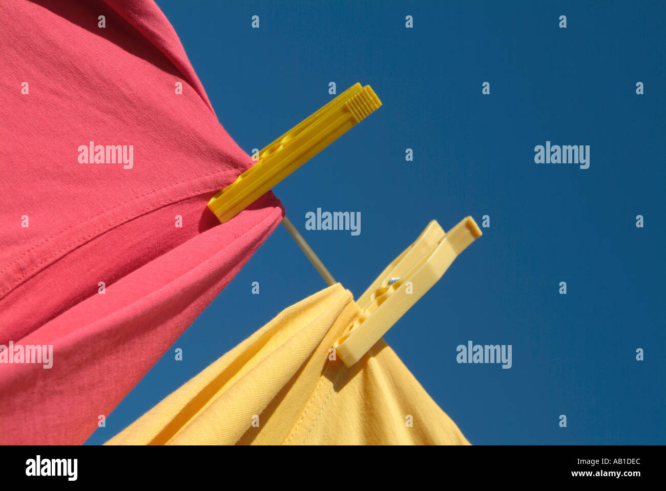 Clothes pegged on washing line Stock Photo - Alamy