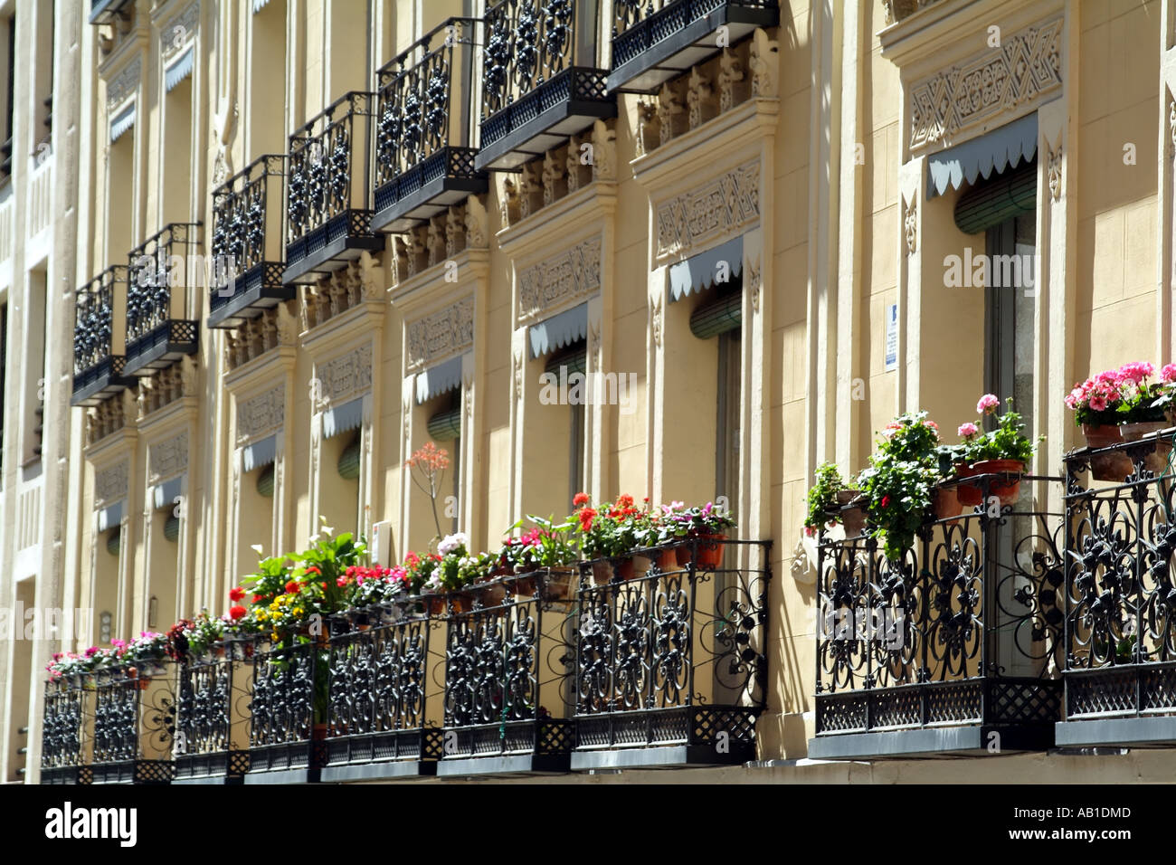 Buildings and balconies with flower boxes central Madrid Spain Europe ...