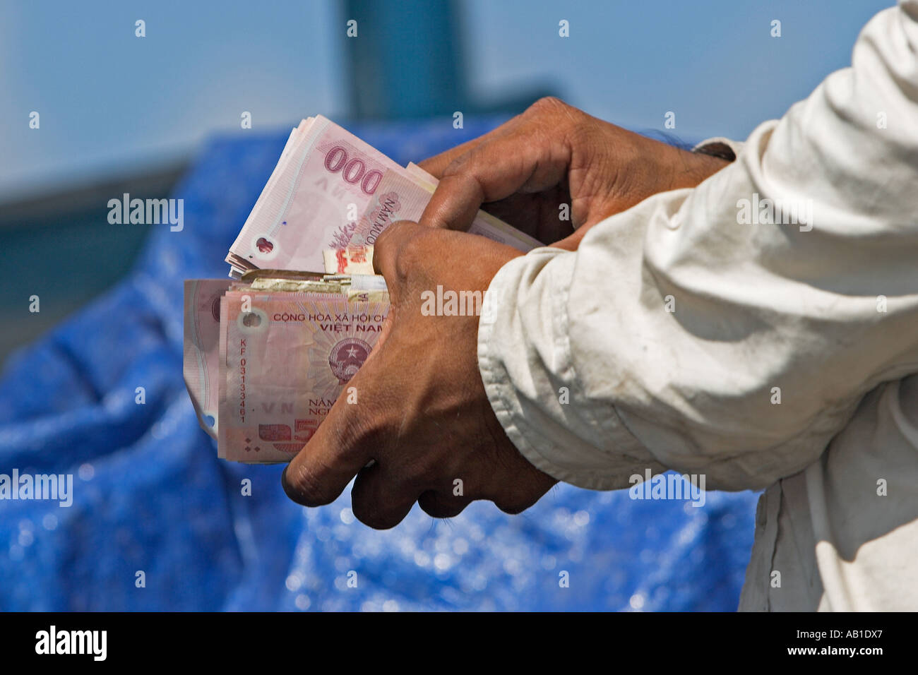 Counting money Cai Ran floating market near Can Tho Vietnam Stock Photo ...