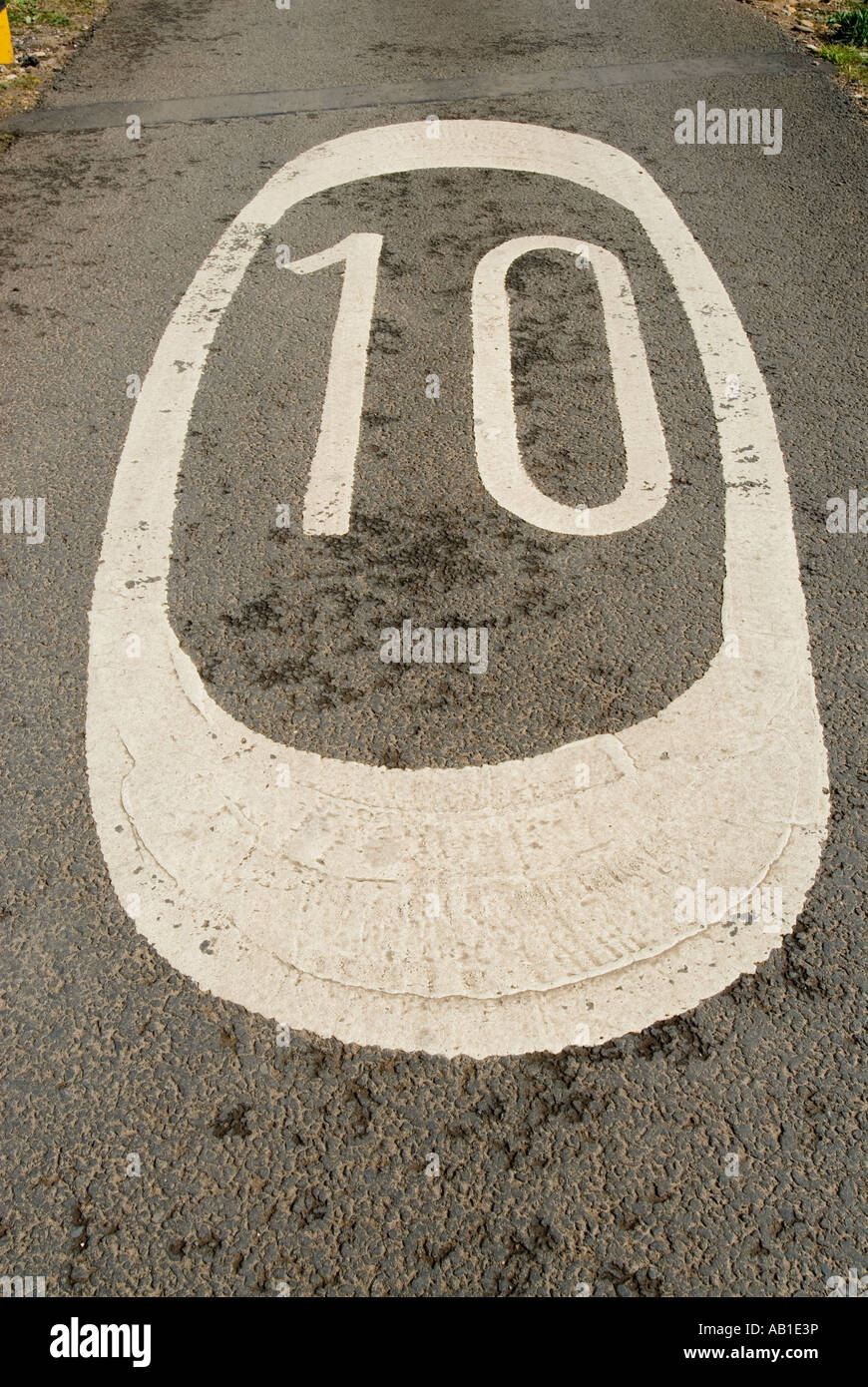speed limit marking on road Stock Photo - Alamy