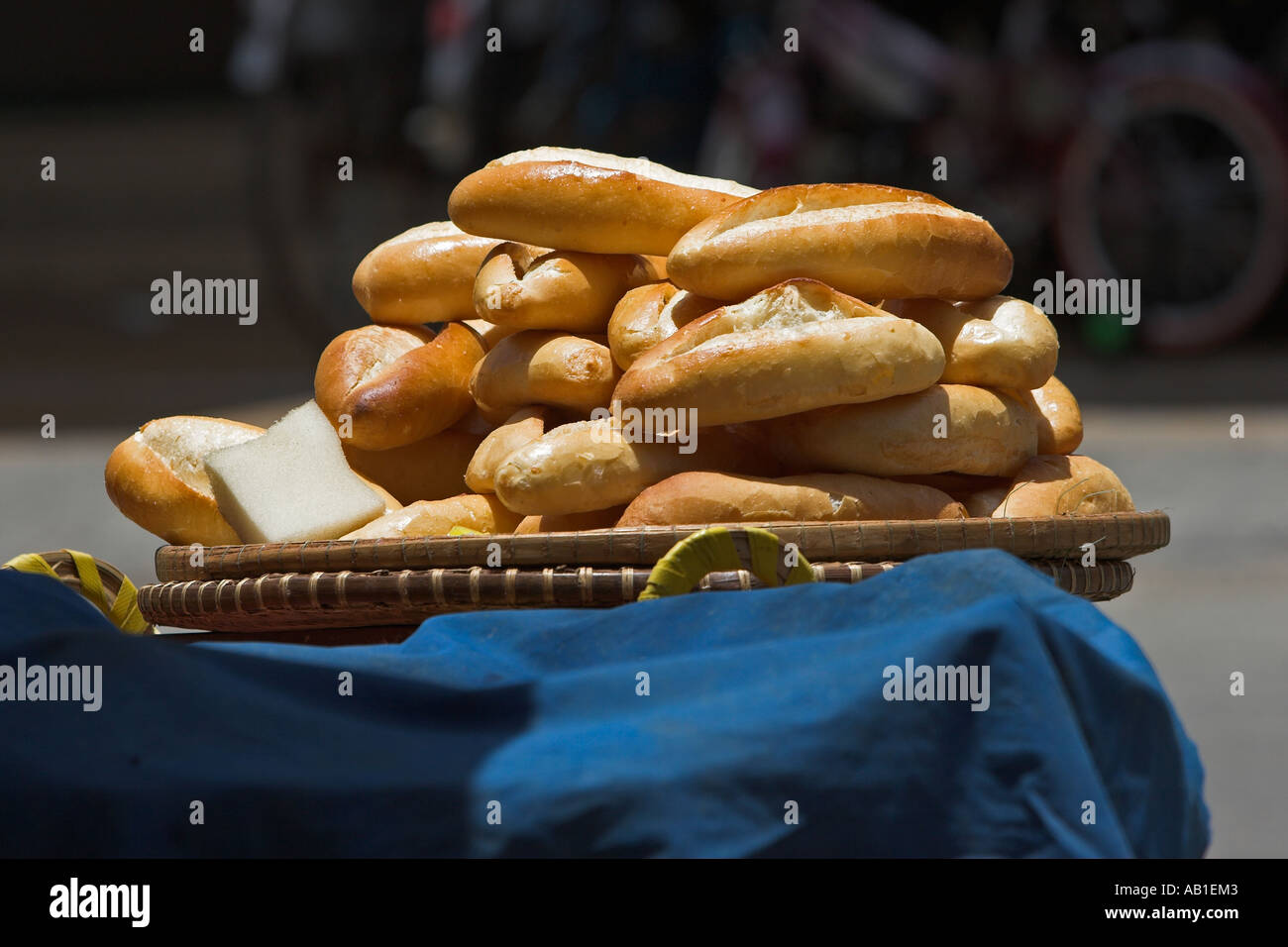 Crusty French style fresh bread roll display at roadside stand Phan ...