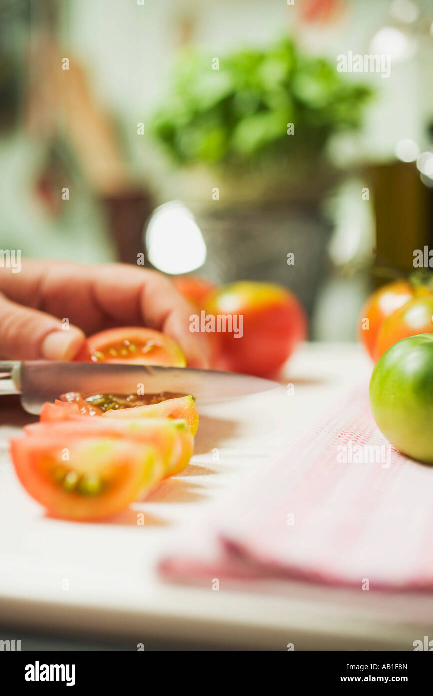 Slicing tomato FoodCollection Stock Photo - Alamy