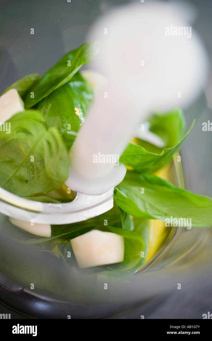 Chopping basil and garlic FoodCollection Stock Photo - Alamy