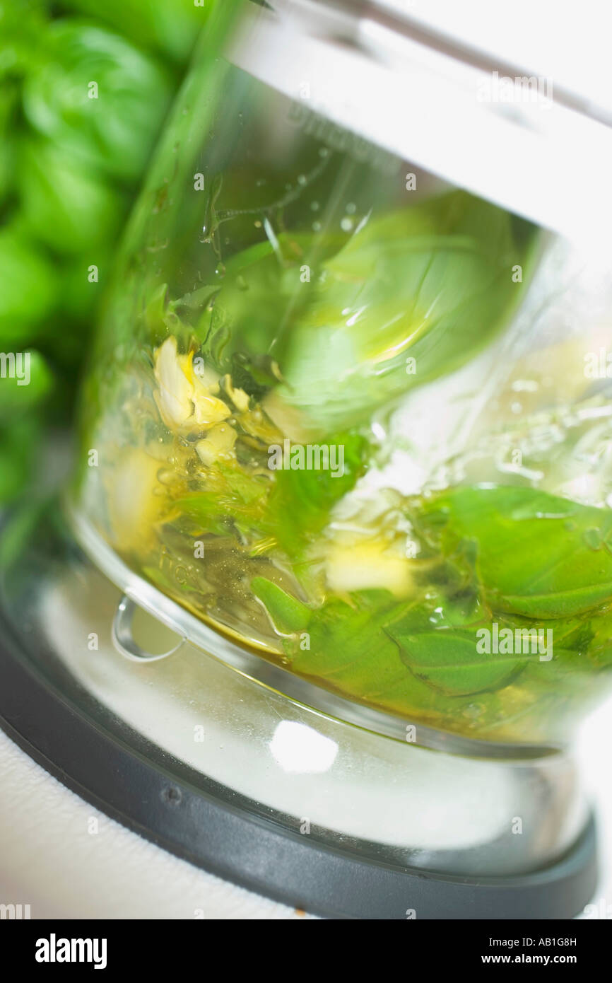 Chopping basil and garlic FoodCollection Stock Photo - Alamy