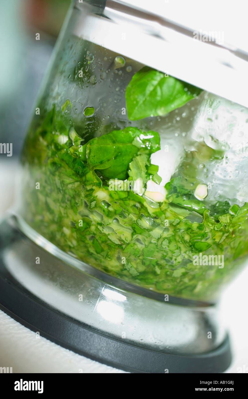Chopping basil and garlic FoodCollection Stock Photo - Alamy
