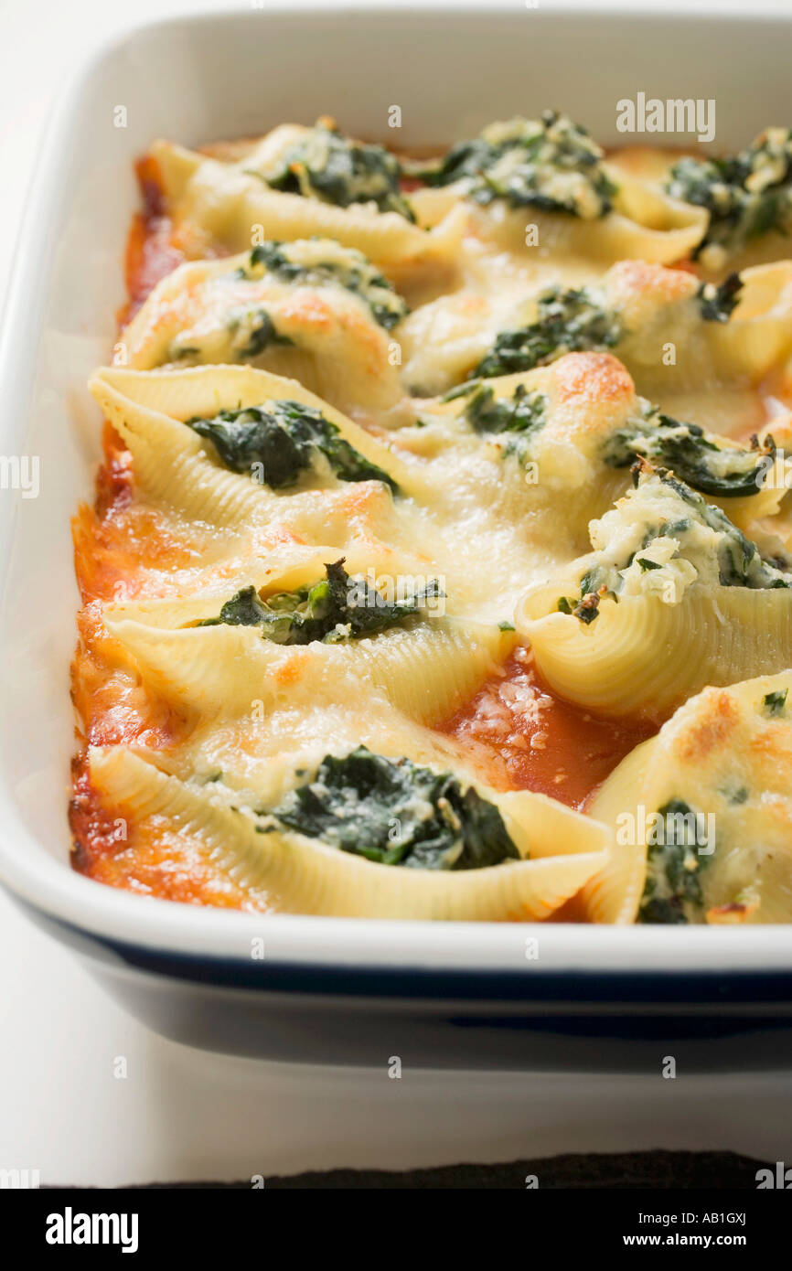 Baked pasta shells with spinach filling FoodCollection Stock Photo - Alamy