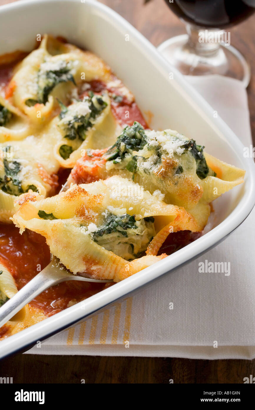 Baked pasta shells with spinach filling FoodCollection Stock Photo - Alamy